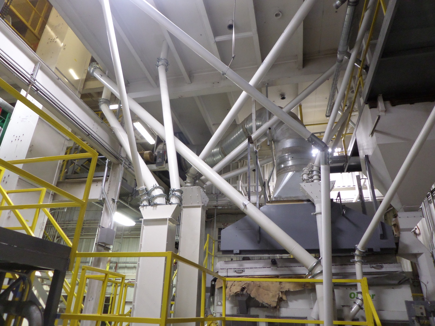 Spouts, chutes, and transitions: Gravity flow design is critical for ...